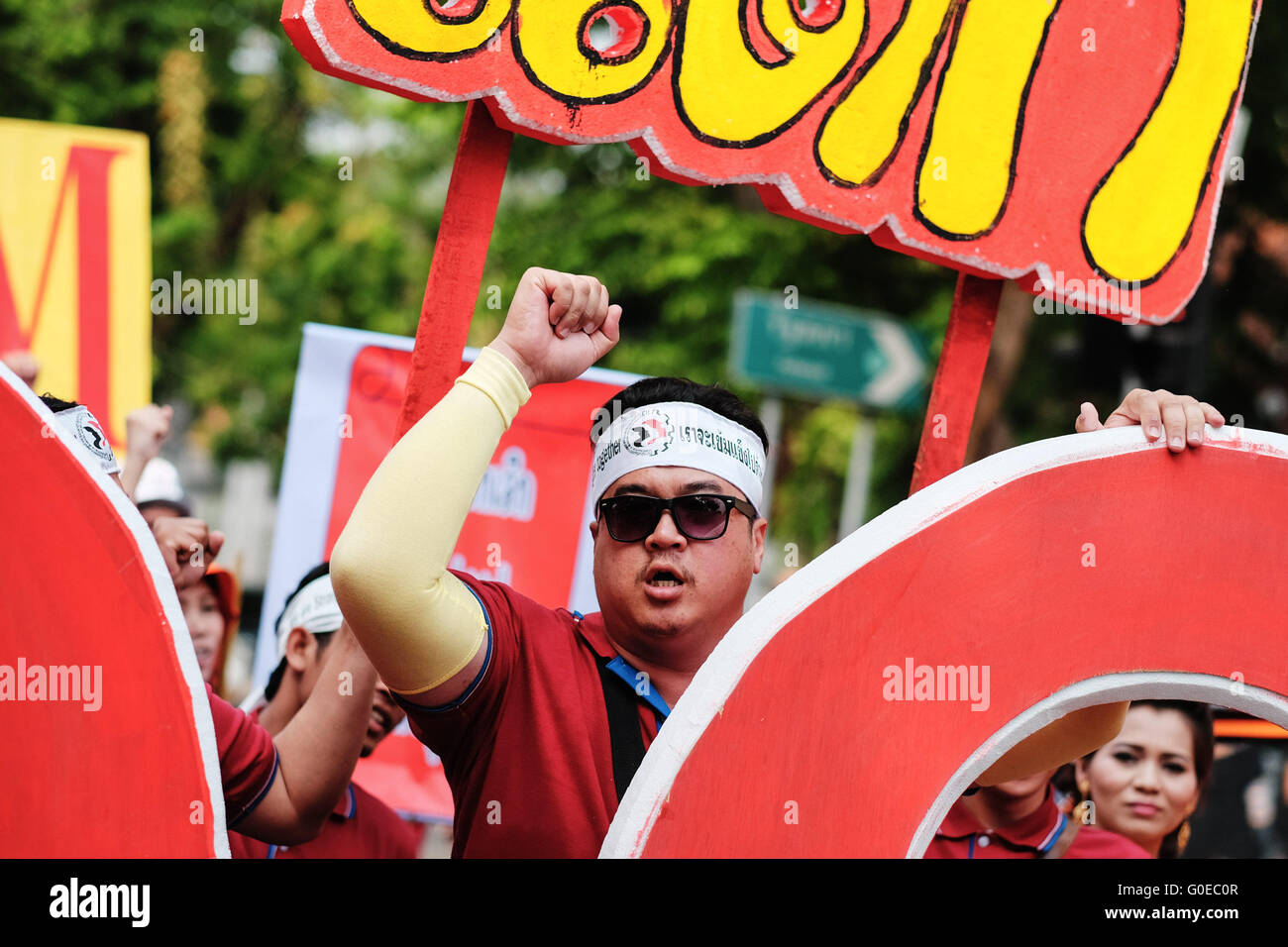 Bangkok, Thailand. 1st May, 2016. A worker shouts slogans as he attends ...