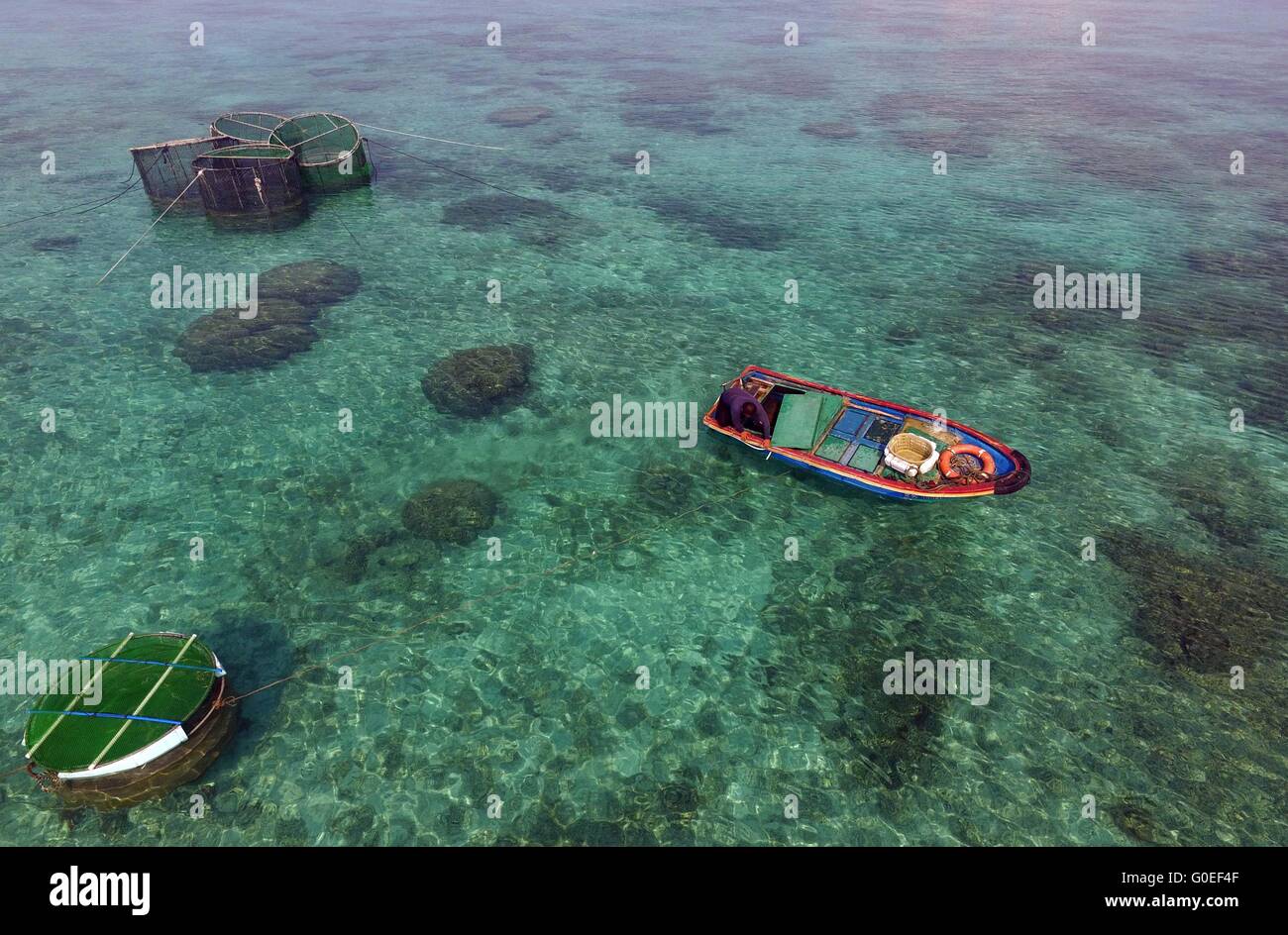 Sansha, China's Hainan Province. 30th Apr, 2016. A fisherman works in ...