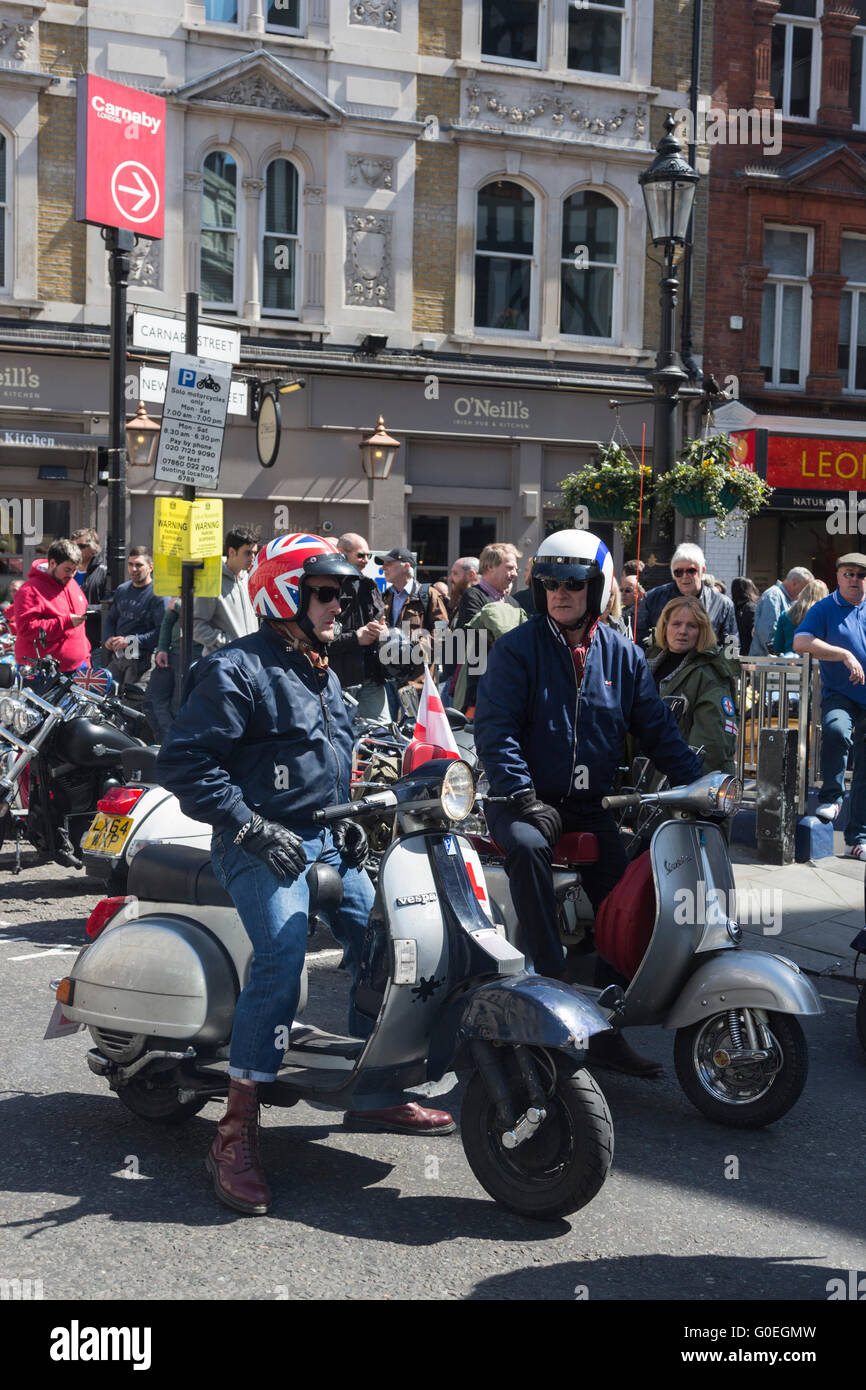 London, UK. 1 May 2016. Scooterists gather at Carnarby Street before ...