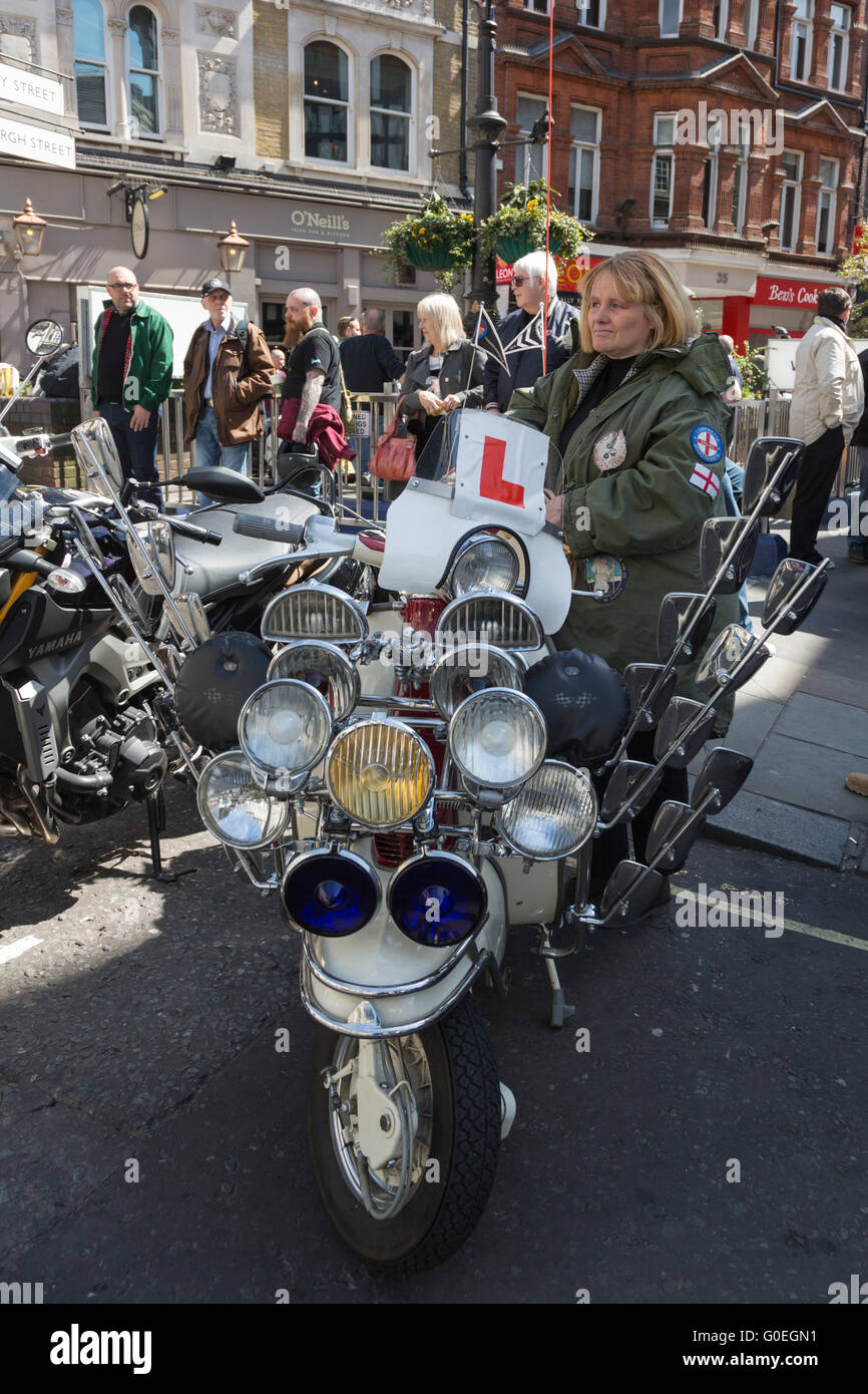 Female scooterist hi-res stock photography and images - Alamy