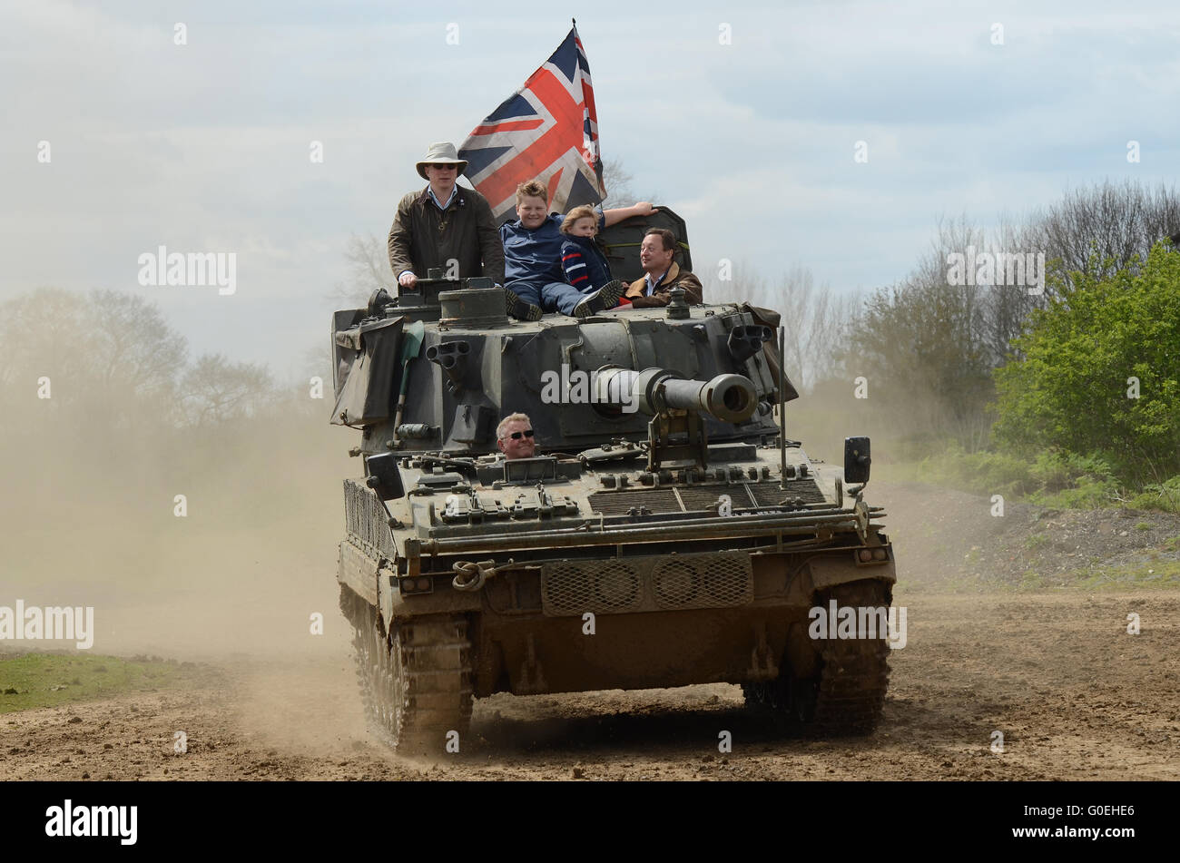Tank rides at an event. Public riding on the outside of a tank Stock ...