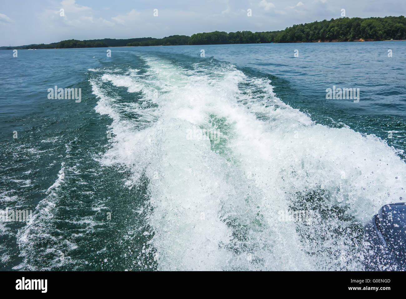 wake waves from boat on lake Stock Photo - Alamy