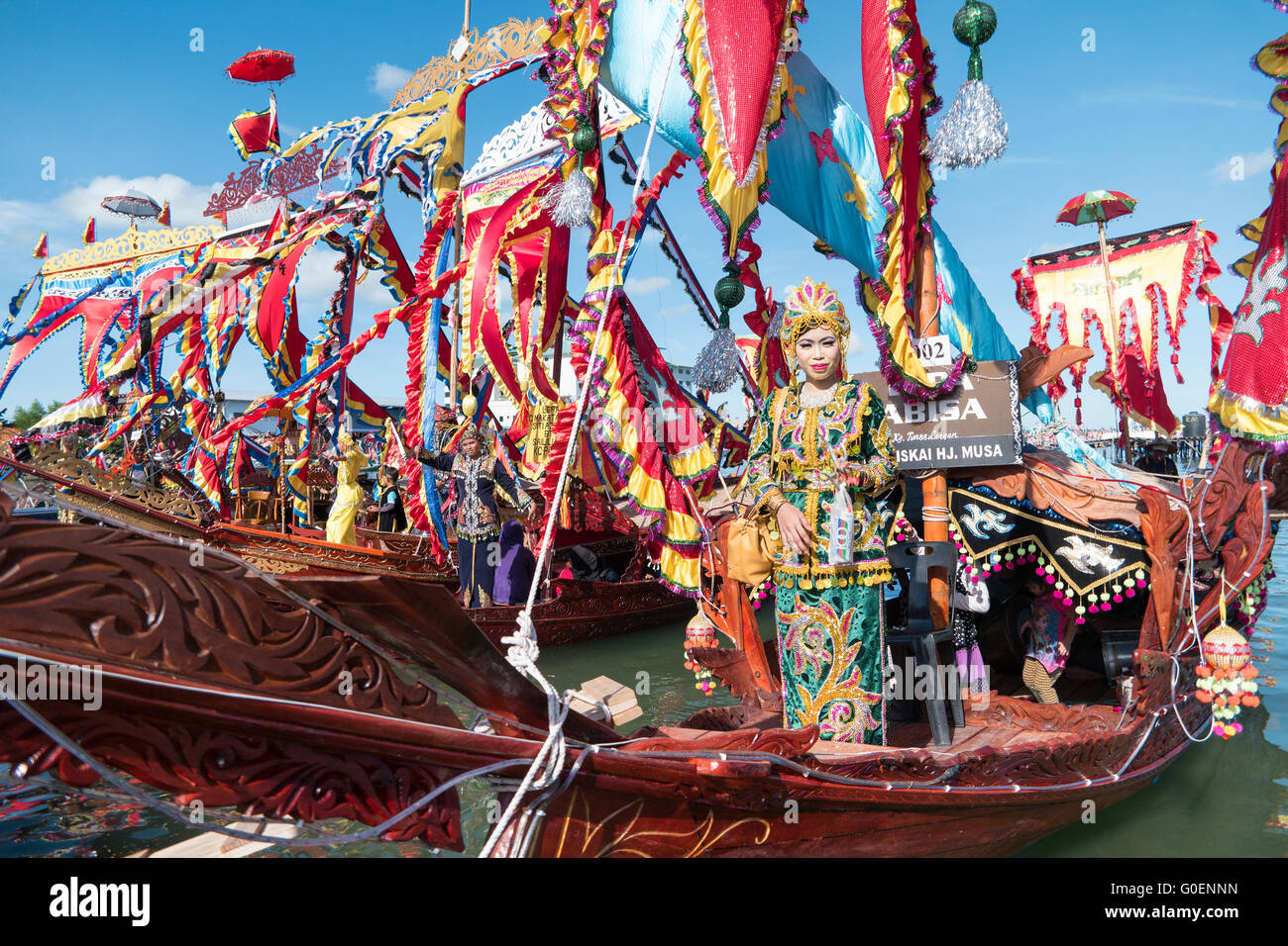 :Bajau lady pose for camera on traditional boat called Lepa decorated ...