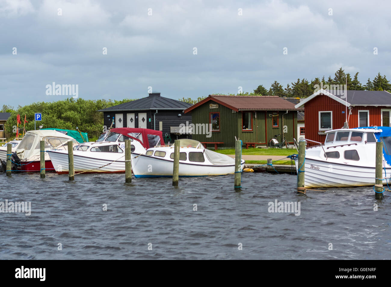 Haven with boat Stock Photo - Alamy