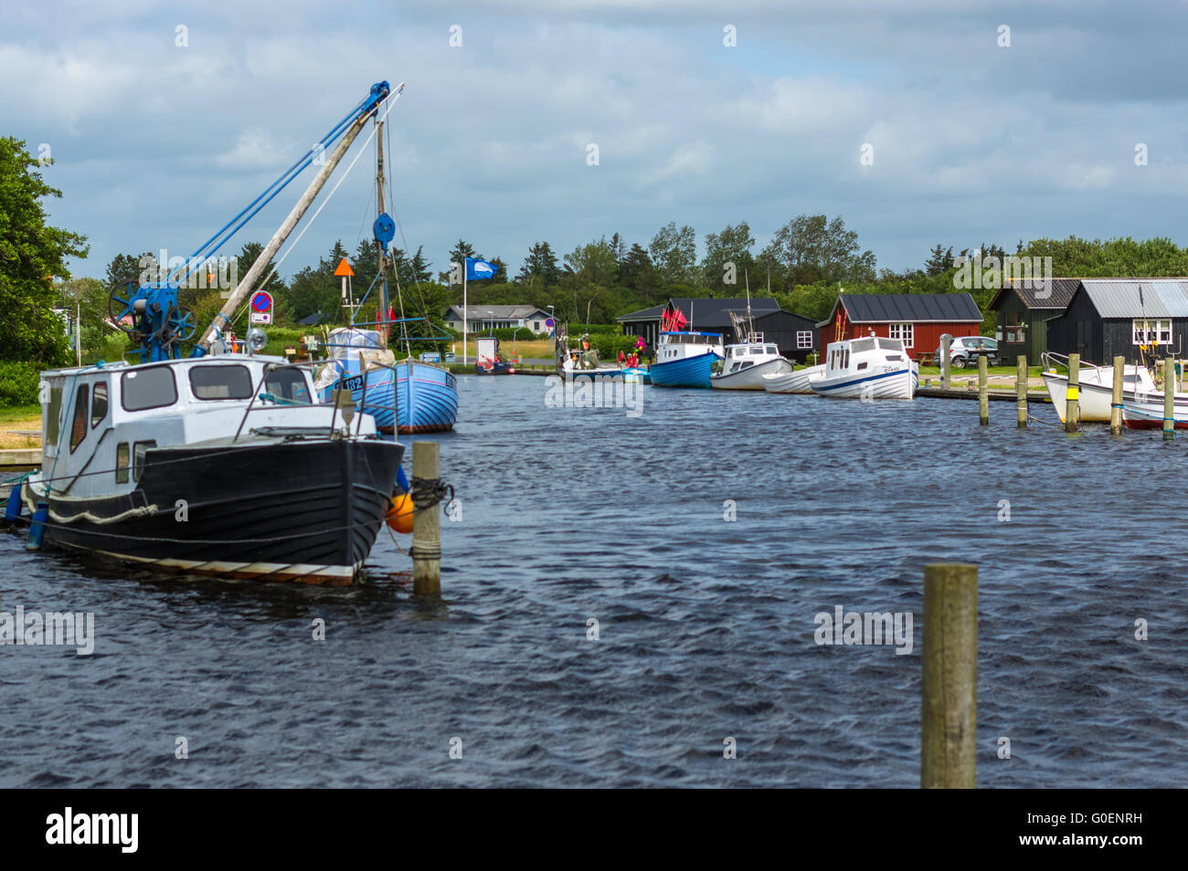 Haven with boat Stock Photo - Alamy