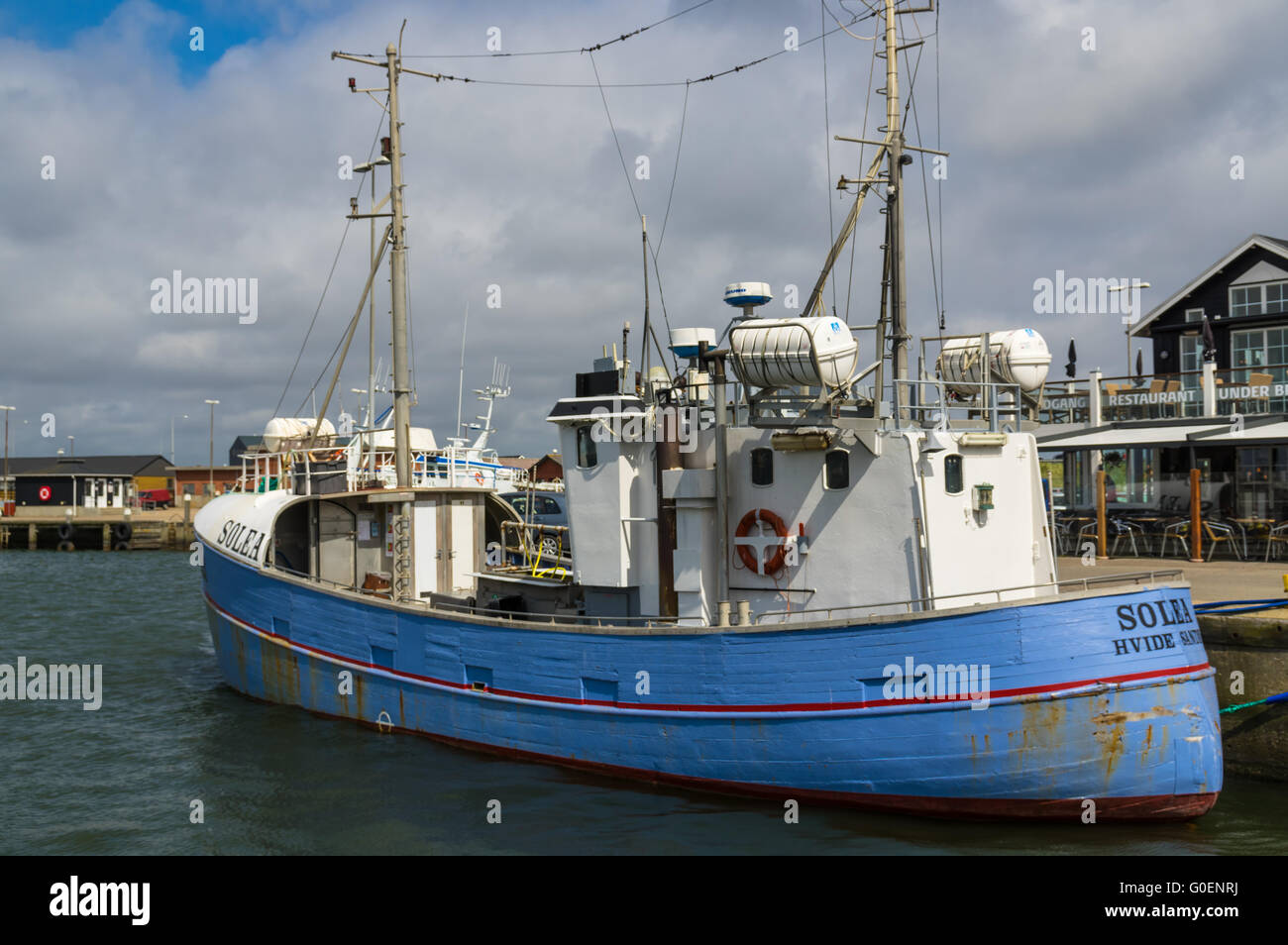 Haven with boat Stock Photo - Alamy