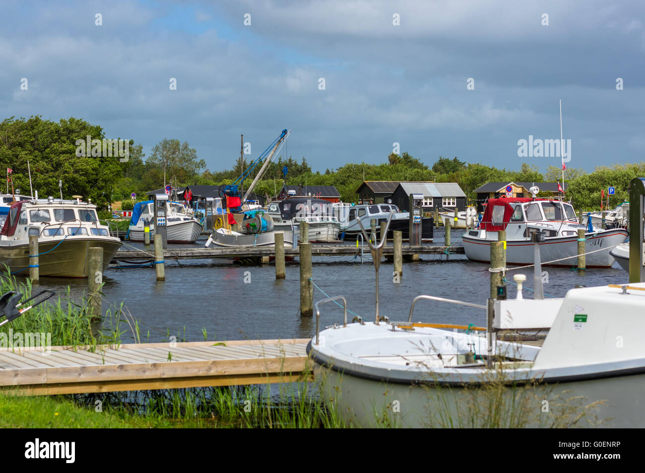 Haven with boat Stock Photo - Alamy