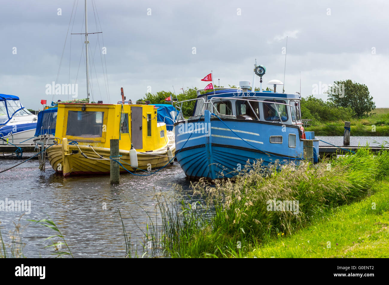 Haven with boat Stock Photo - Alamy