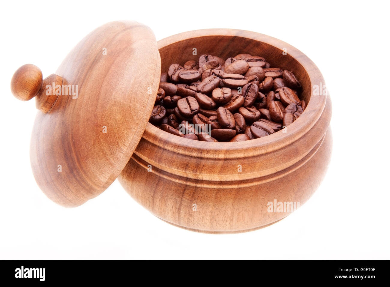 coffee in a wooden container with the lid open. Isolated on white ...