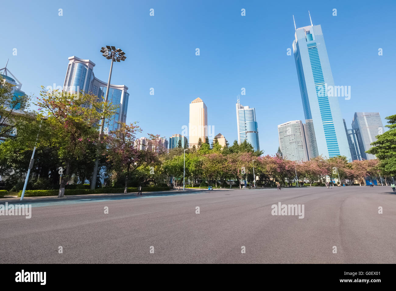 asphalt pavement with modern urban background Stock Photo - Alamy