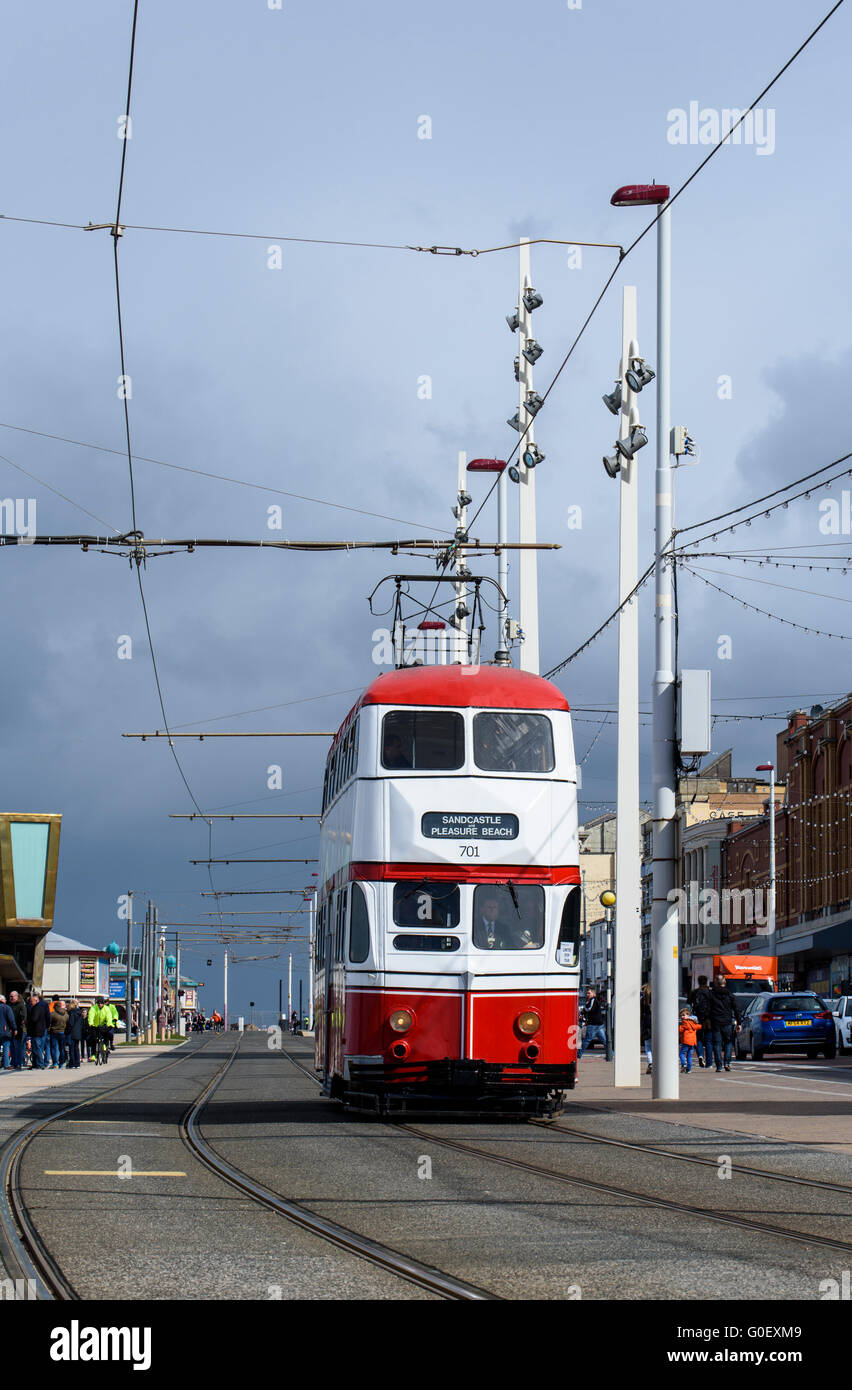 Vintage tram travels along the seafront promenade in Blackpool ...