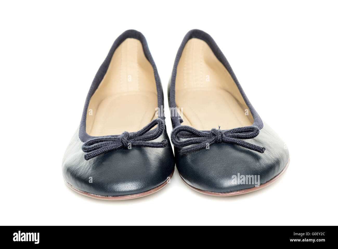 Pair of female shoes over white background front view Stock Photo - Alamy