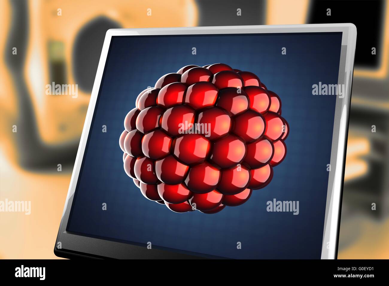Atom model on blue background at monitor Stock Photo - Alamy