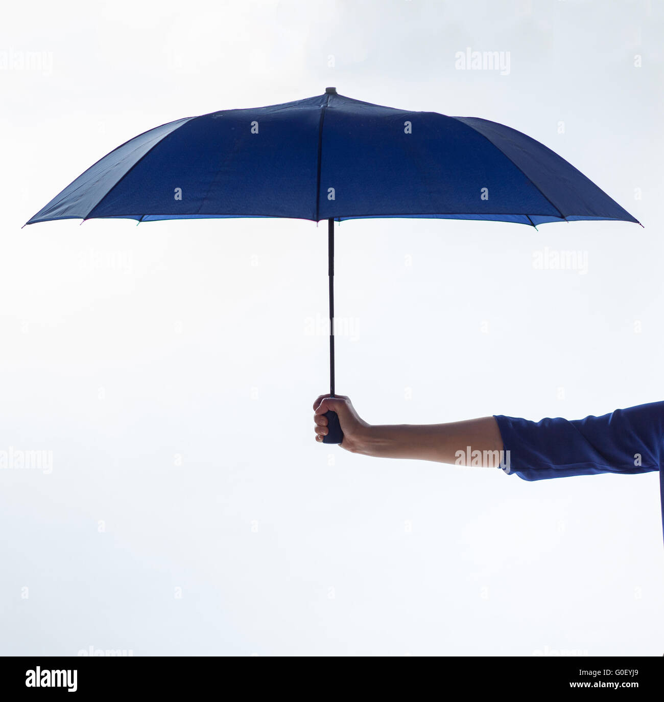 Hand with umbrella Stock Photo - Alamy