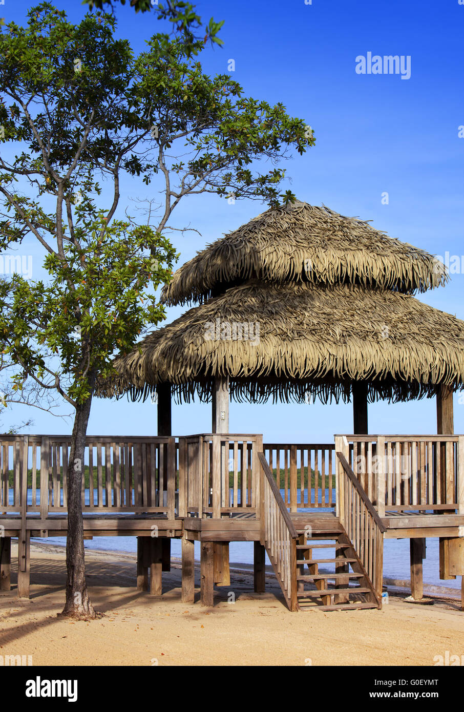 Pavilion in natural style on a beach Stock Photo - Alamy
