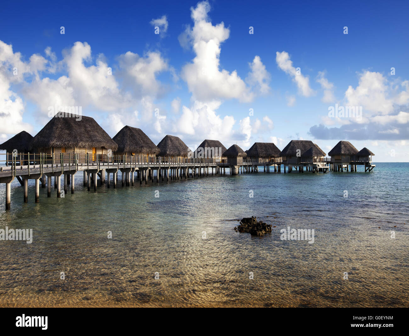 Typical Polynesian landscape -small houses on wate Stock Photo - Alamy