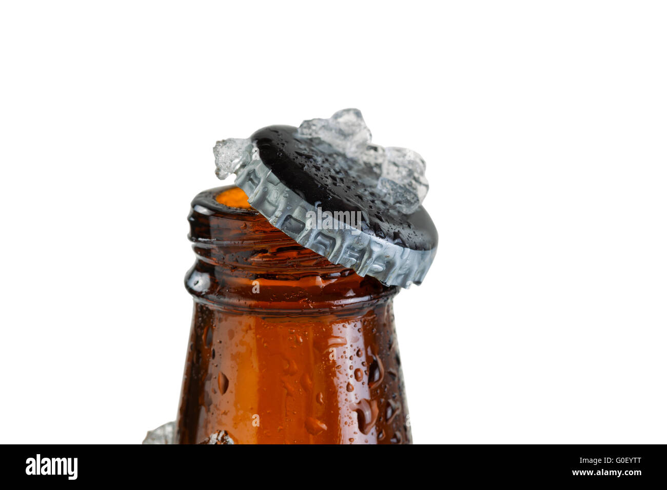 Close up view of an ice cold beer bottle neck and removed cap Stock ...