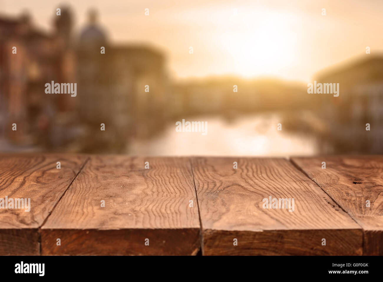 Empty wooden table against Venice Stock Photo - Alamy