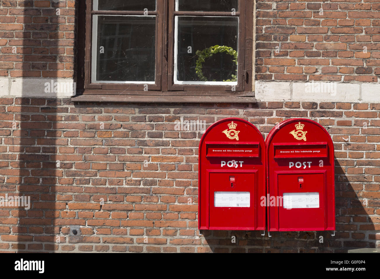 Two red mail boxes Stock Photo - Alamy