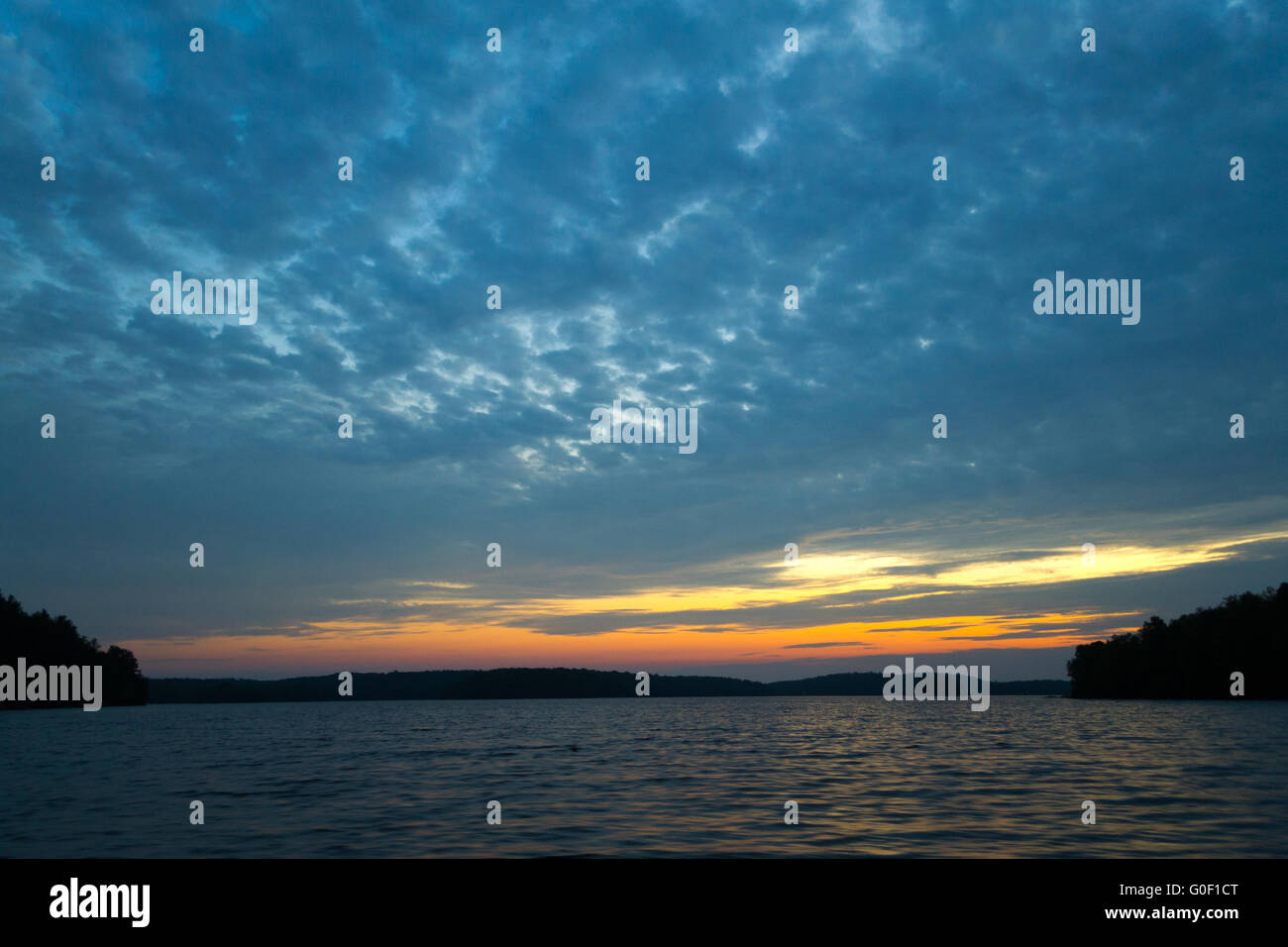 Sunset in duck lake Stock Photo - Alamy