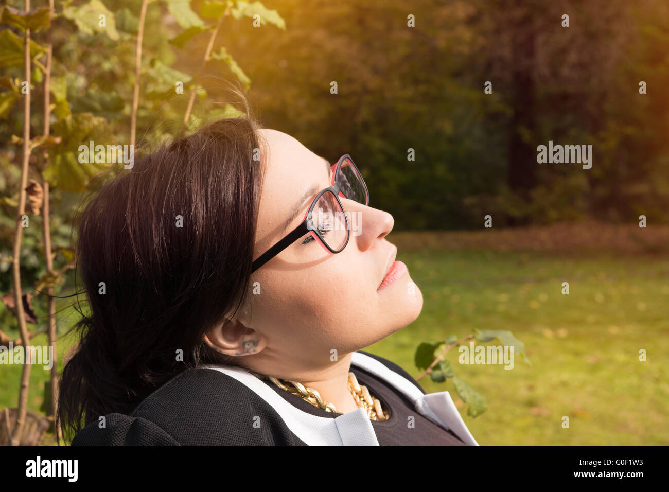 Woman relaxing in the sun hi-res stock photography and images - Alamy