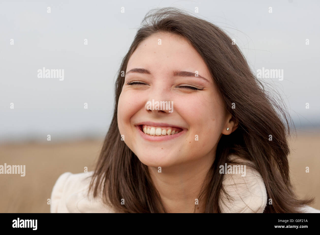 young woman smiling Stock Photo - Alamy