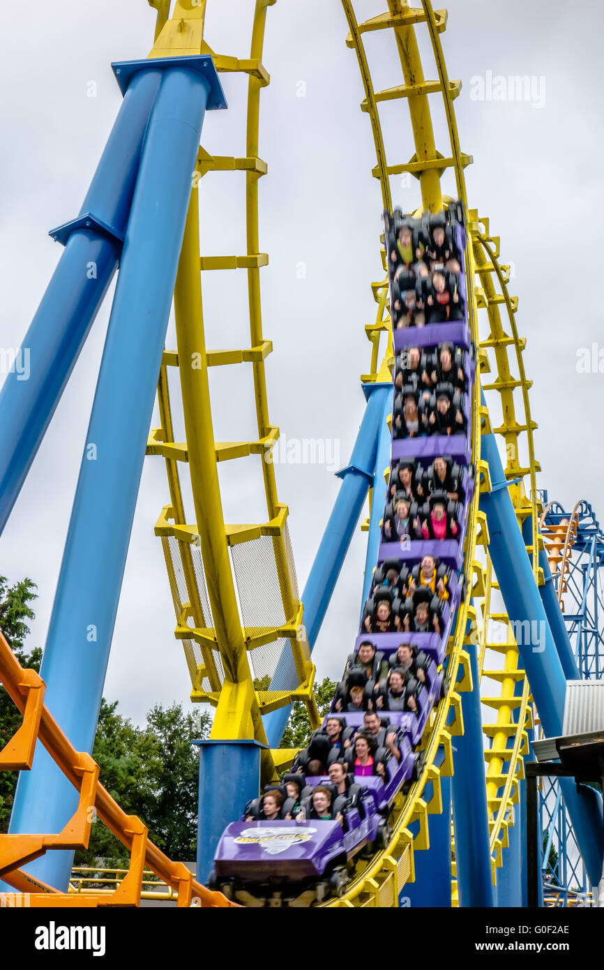 crazy rollercoaster rides at amusement park Stock Photo - Alamy