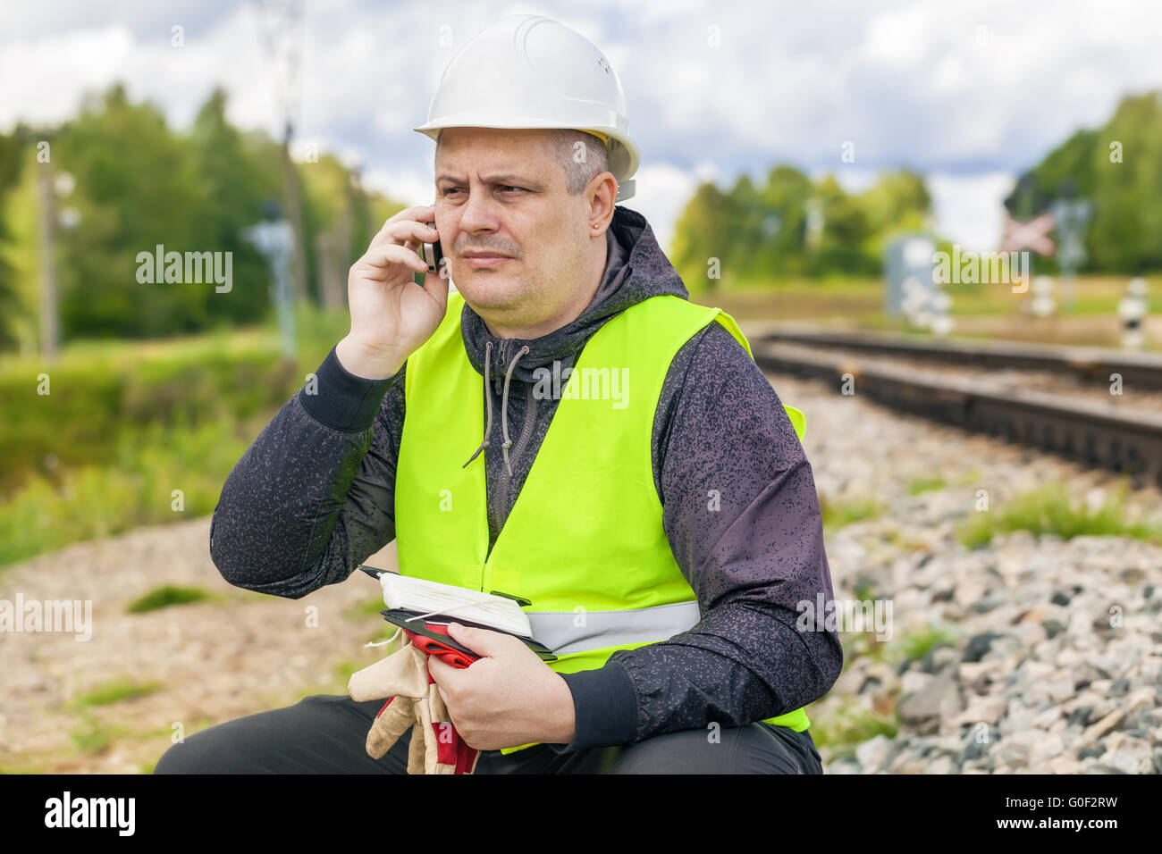 Rail worker phone hi-res stock photography and images - Alamy