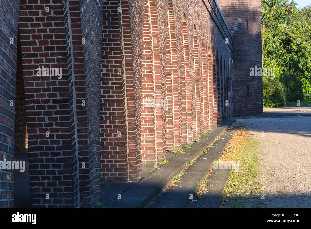 Building with arches of brick Stock Photo - Alamy