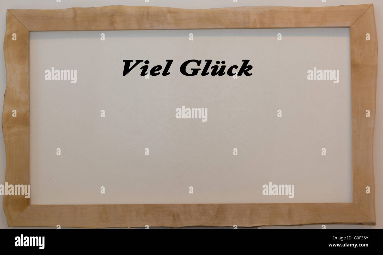 Good luck is in a wooden picture frame - isolated Stock Photo - Alamy