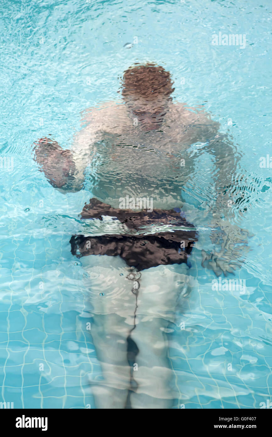 Man sits pool hi-res stock photography and images - Alamy