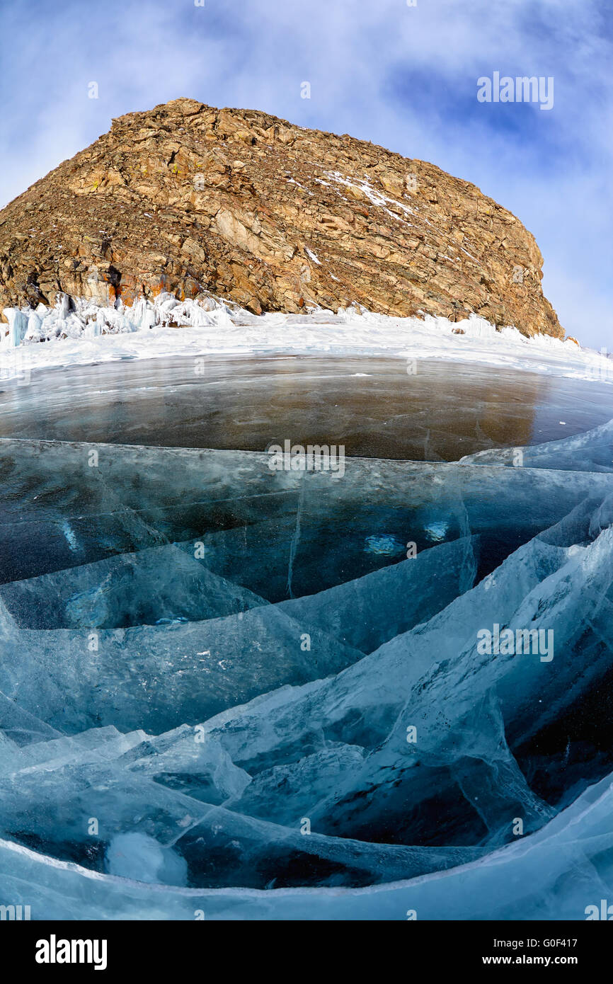 Rocks frozen into the ice of Baikal Lake in winter Stock Photo - Alamy