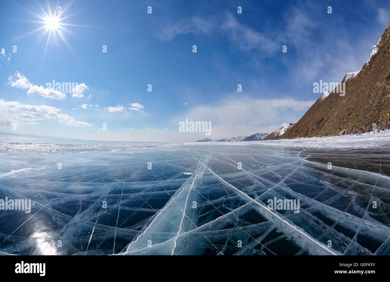 Winter ice landscape on Siberian lake Baikal with clouds Stock Photo ...