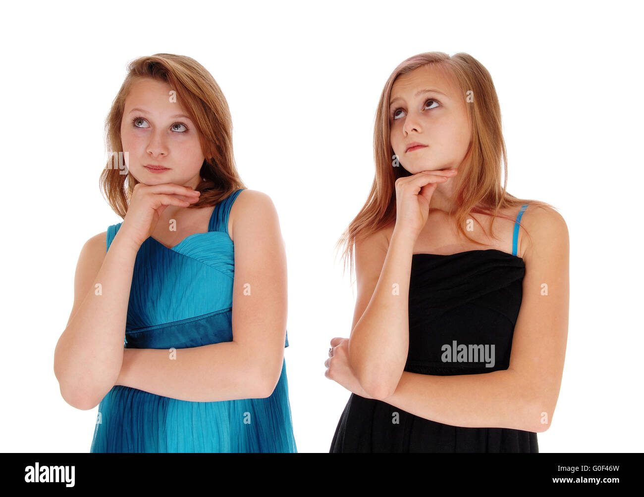 Two pretty girls thinking hard Stock Photo - Alamy
