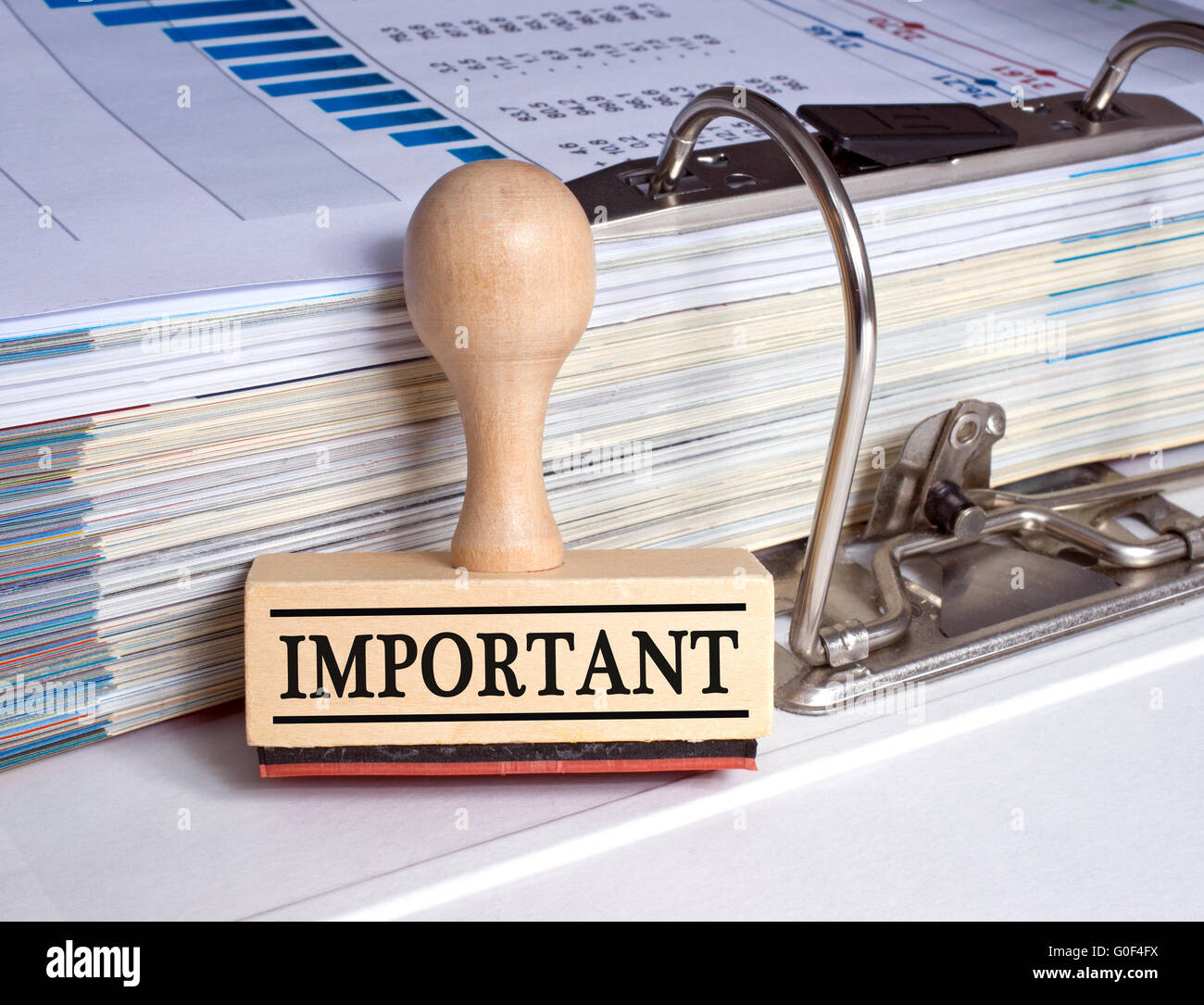 Important stamp with binder in the office Stock Photo - Alamy