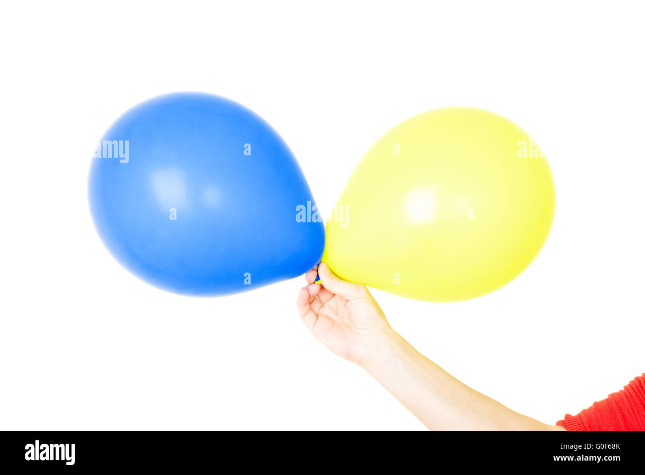 Child hand holding balloons hi-res stock photography and images - Alamy