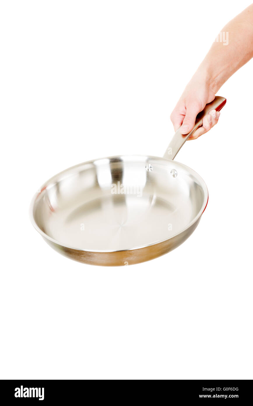 Steel frying pan hold hand hi-res stock photography and images - Alamy
