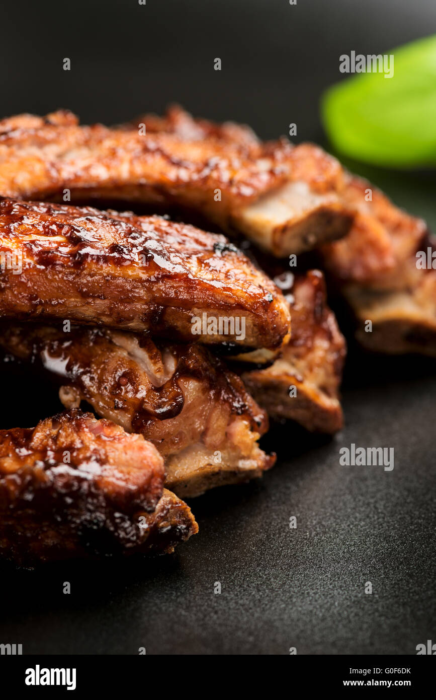 Barbecued ribs vertical Stock Photo - Alamy