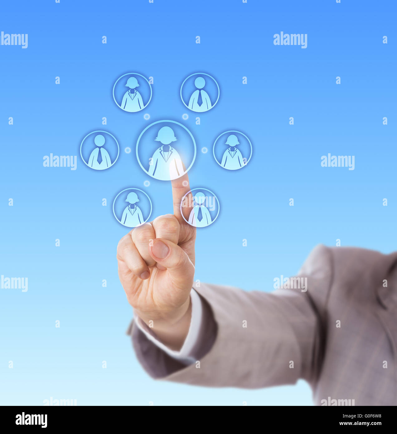 Arm Contacting A Work Team With A Female Leader Stock Photo - Alamy