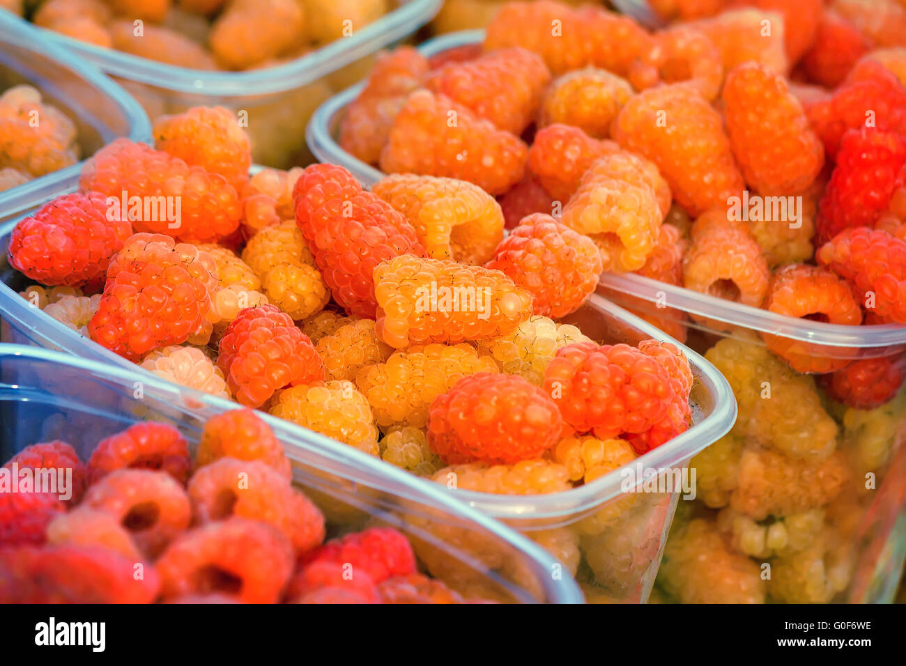Raspberries in containers for sale Stock Photo - Alamy