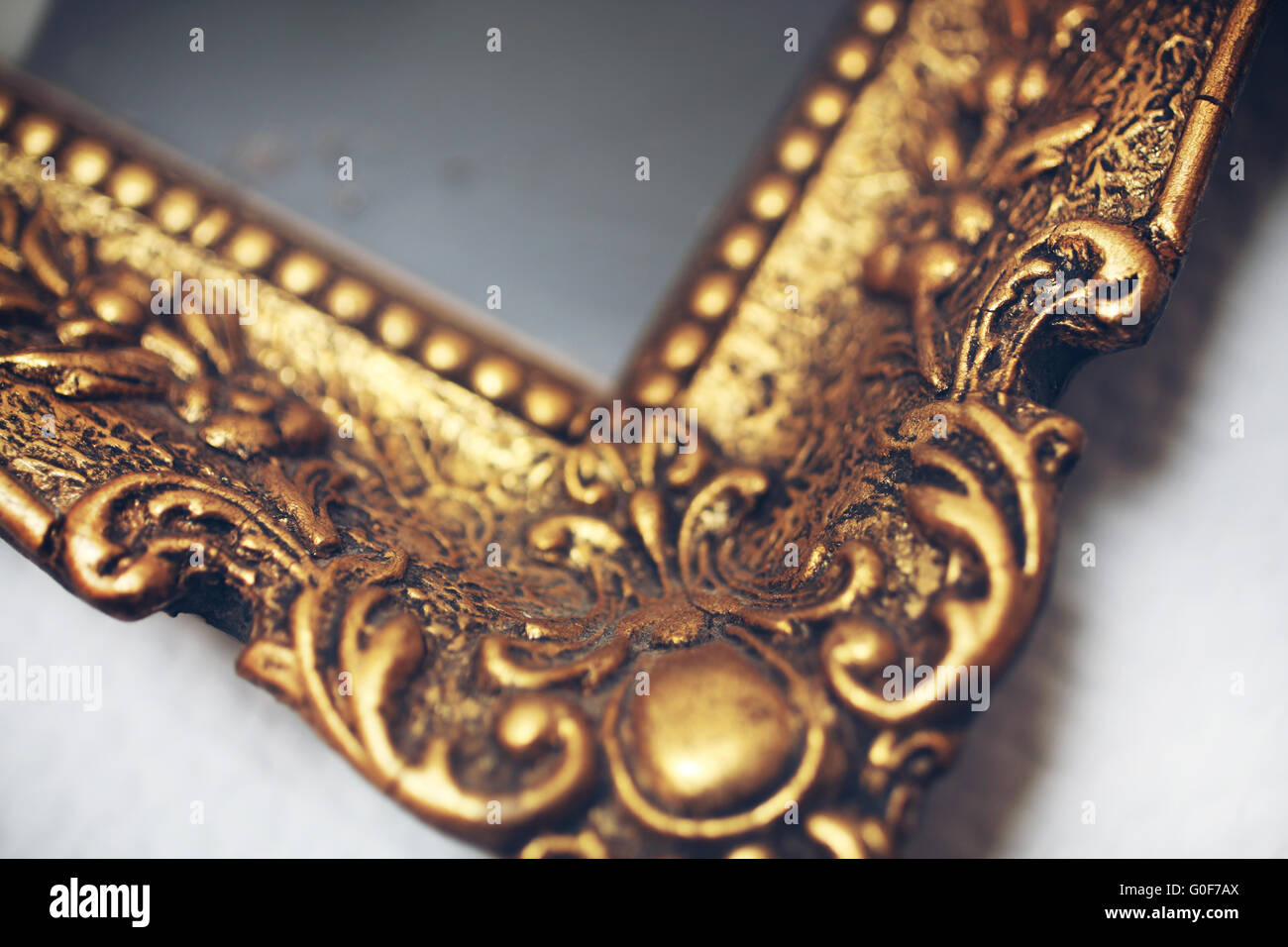 Detail of an antik gold picture frame Stock Photo - Alamy
