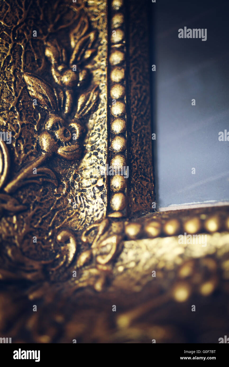 Detail of an antik gold picture frame Stock Photo - Alamy