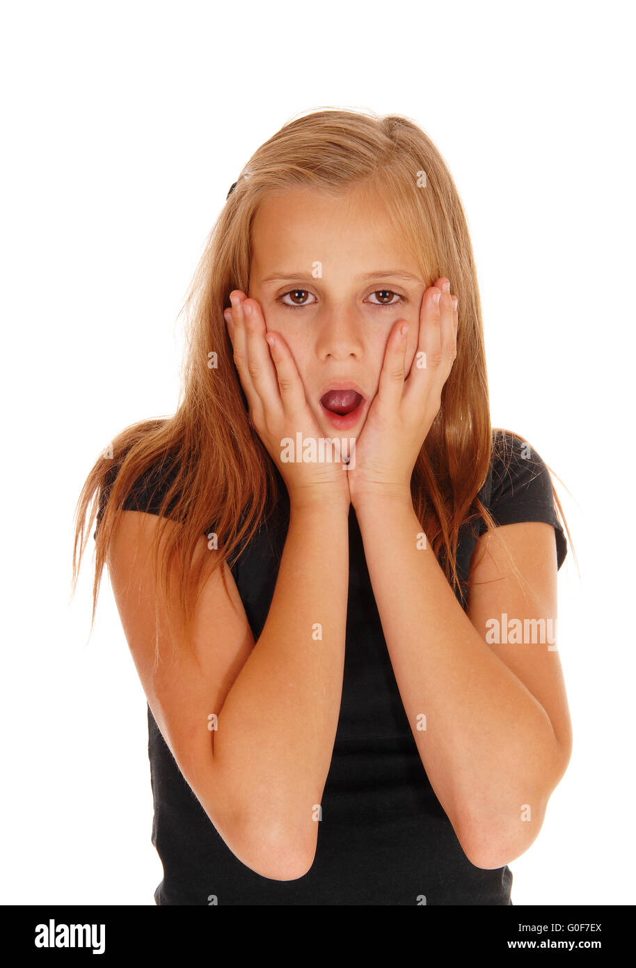 Scared looking young girl Stock Photo - Alamy