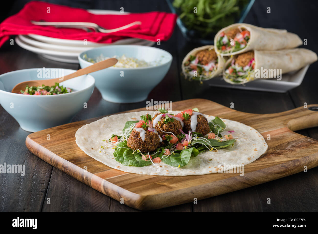 Vegan Falafel Wrap With Salsa and salad Stock Photo - Alamy