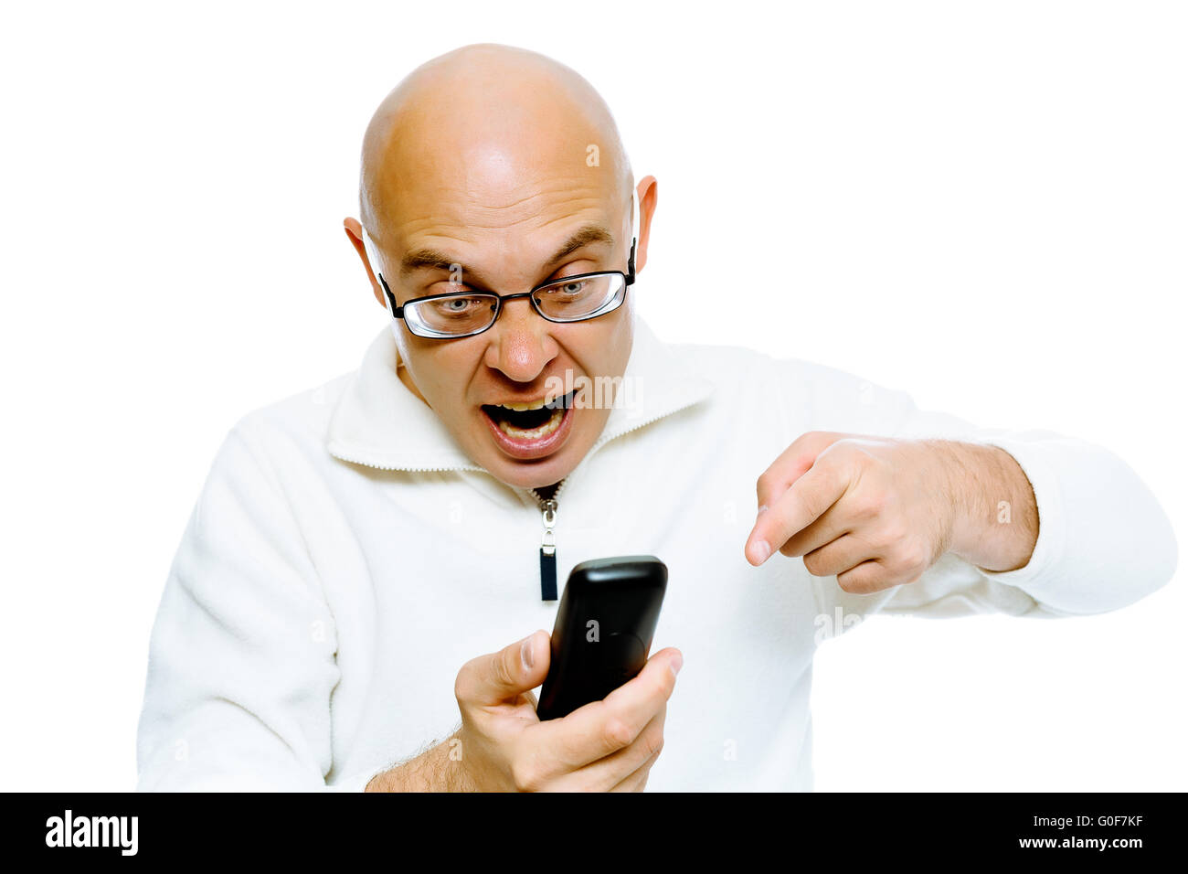 Bald man screaming into the phone. Studio. isolated Stock Photo - Alamy
