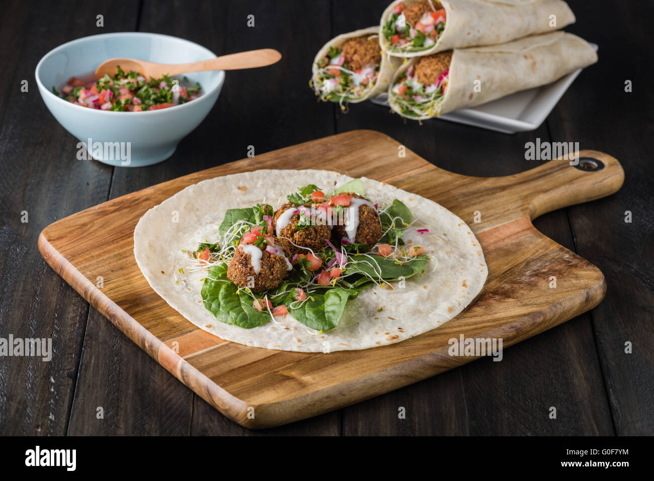 Vegan Falafel Wrap With Salsa and salad Stock Photo - Alamy