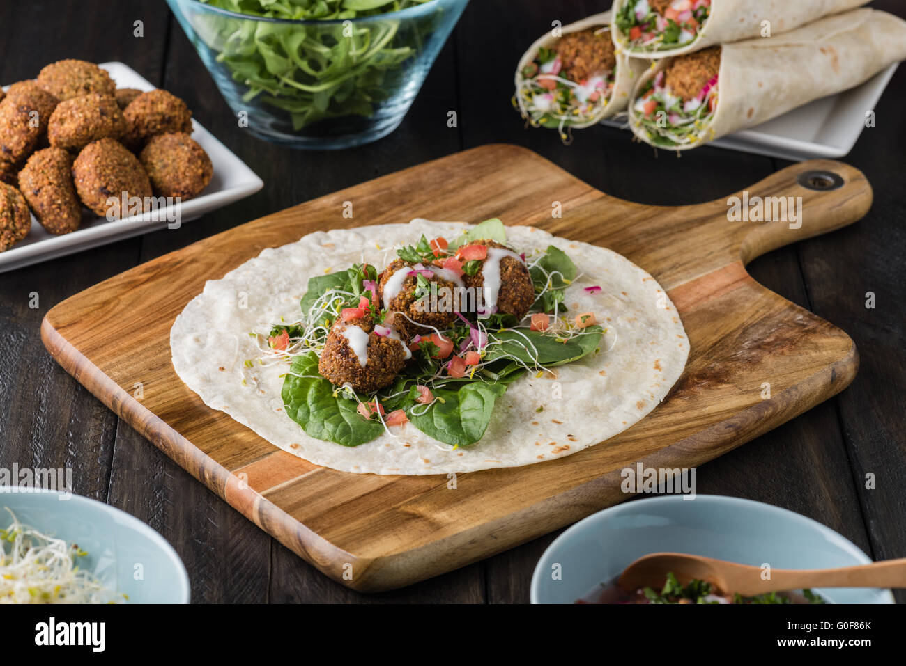 Spinach falafel wrap hi-res stock photography and images - Alamy