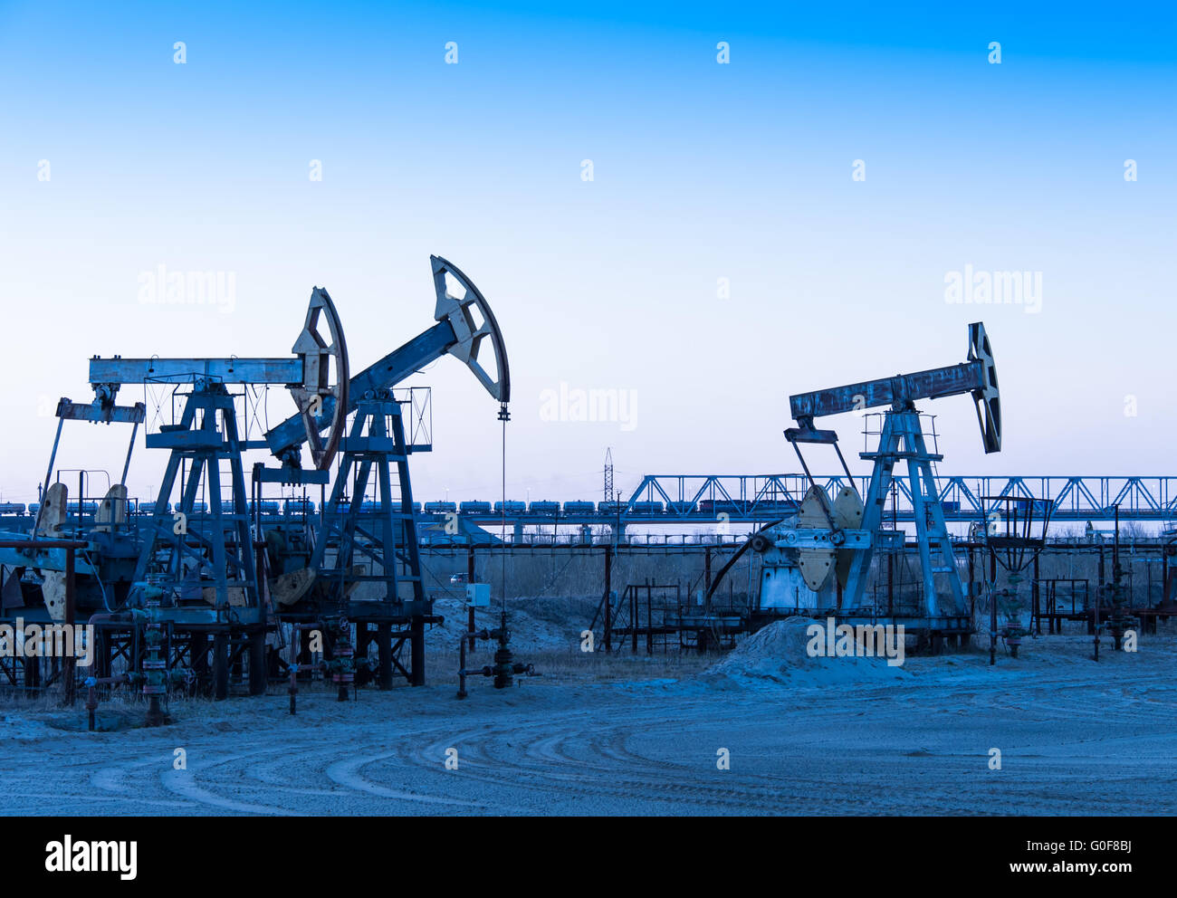Oil pumps on a oil field Stock Photo - Alamy