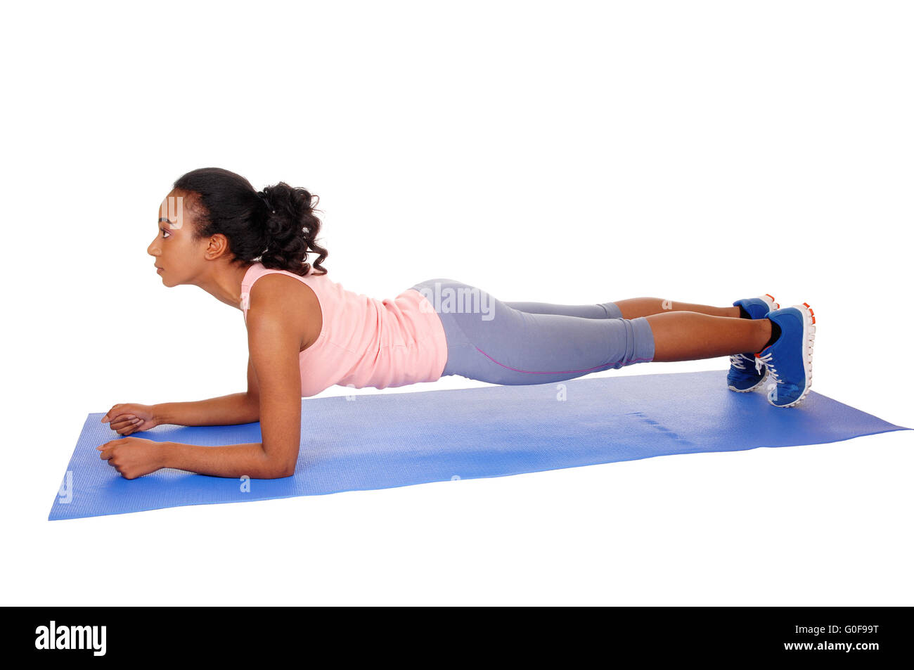 Beautiful african american woman exercising Stock Photo - Alamy