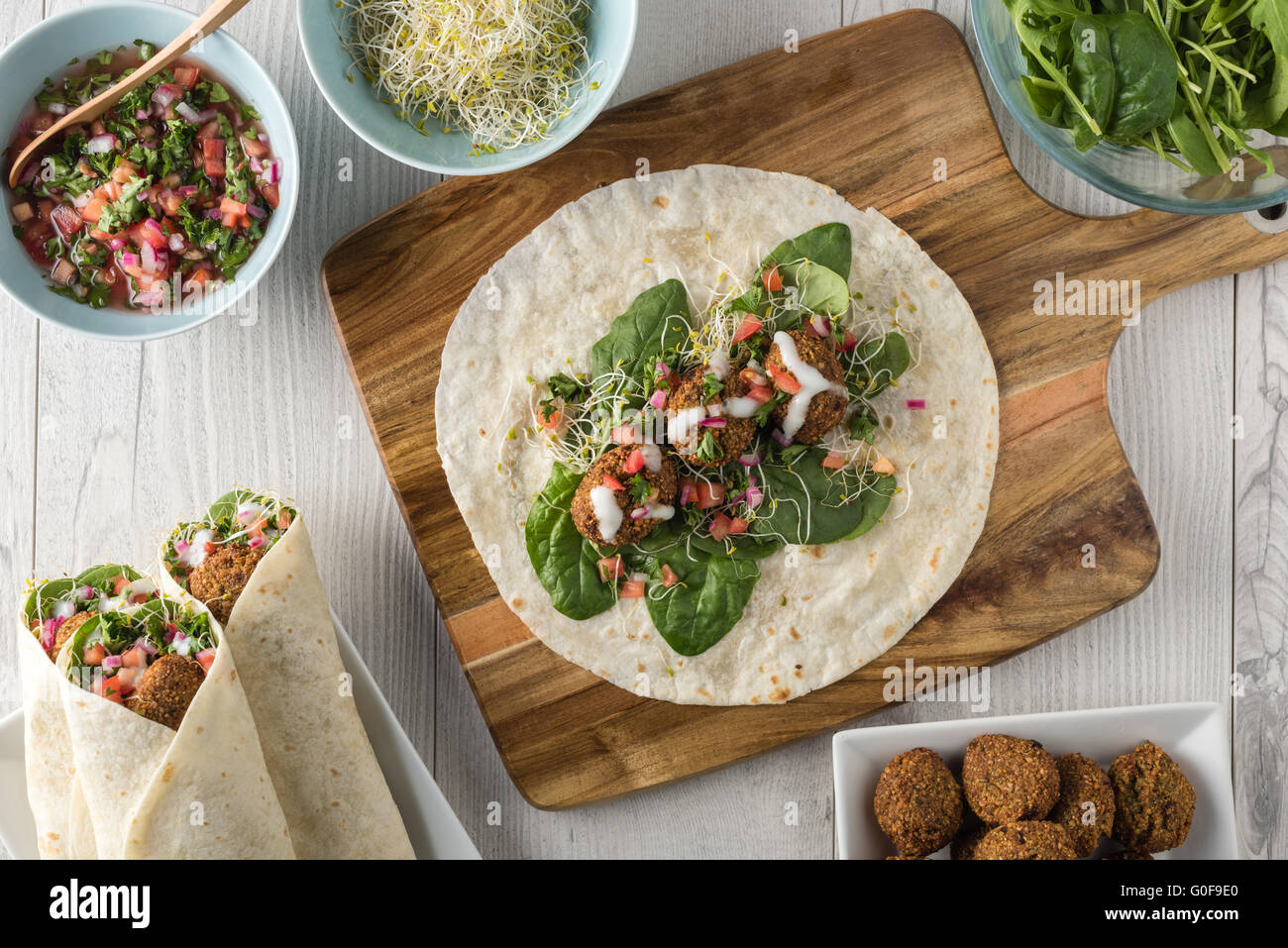 Spinach falafel wrap hi-res stock photography and images - Alamy